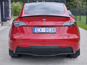 Sarkans Tesla Model Y 2021 Rīga, ar dzinēja tilpumu 0.00 L un nobraukumu 82 tūkst. km par 28800 €, foto 7 vietnē AUTOMOTO.COM.LV