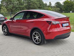 Sarkans Tesla Model Y 2021 Rīga, ar dzinēja tilpumu 0.00 L un nobraukumu 82 tūkst. km par 28800 €, foto 8 vietnē AUTOMOTO.COM.LV