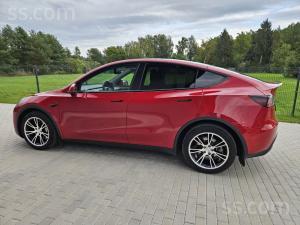 Sarkans Tesla Model Y 2021 Rīga, ar dzinēja tilpumu 0.00 L un nobraukumu 82 tūkst. km par 28800 €, foto 10 vietnē AUTOMOTO.COM.LV