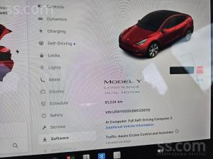 Sarkans Tesla Model Y 2021 Rīga, ar dzinēja tilpumu 0.00 L un nobraukumu 82 tūkst. km par 28800 €, foto 12 vietnē AUTOMOTO.COM.LV