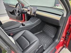 Sarkans Tesla Model Y 2021 Rīga, ar dzinēja tilpumu 0.00 L un nobraukumu 82 tūkst. km par 28800 €, foto 17 vietnē AUTOMOTO.COM.LV