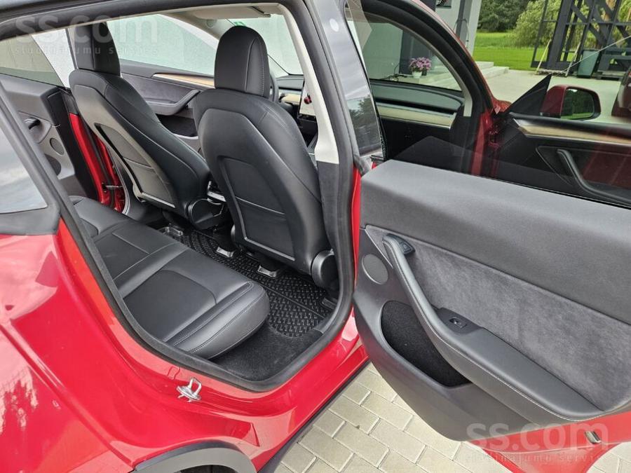 Sarkans Tesla Model Y 2021 Rīga, ar dzinēja tilpumu 0.00 L un nobraukumu 82 tūkst. km par 28800 €, foto 18 vietnē AUTOMOTO.COM.LV