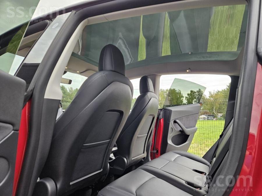 Sarkans Tesla Model Y 2021 Rīga, ar dzinēja tilpumu 0.00 L un nobraukumu 82 tūkst. km par 28800 €, foto 21 vietnē AUTOMOTO.COM.LV