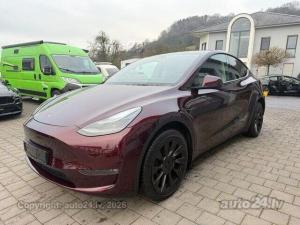 Red Tesla Model Y 2023 in Tallinn, with an engine capacity of 0.00 L and mileage of 54 thousand km for 39990 €, photo  on AUTOMOTO.COM.LV