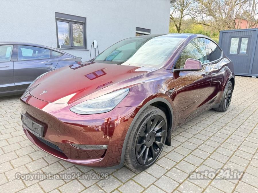 Red Tesla Model Y 2023 in Tartu, with an engine capacity of 0.00 L and mileage of 55 thousand km for 39999 €, photo 3 on AUTOMOTO.COM.LV