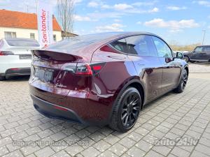 Red Tesla Model Y 2023 in Tartu, with an engine capacity of 0.00 L and mileage of 55 thousand km for 39999 €, photo 4 on AUTOMOTO.COM.LV