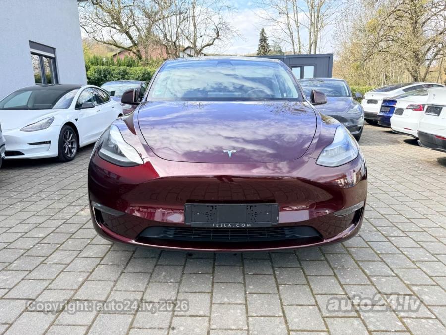 Red Tesla Model Y 2023 in Tartu, with an engine capacity of 0.00 L and mileage of 55 thousand km for 39999 €, photo 6 on AUTOMOTO.COM.LV
