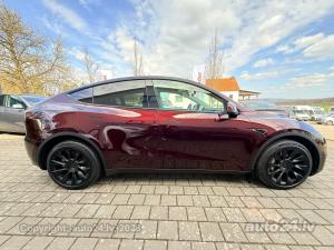 Red Tesla Model Y 2023 in Tartu, with an engine capacity of 0.00 L and mileage of 55 thousand km for 39999 €, photo 8 on AUTOMOTO.COM.LV