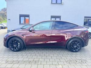 Red Tesla Model Y 2023 in Tartu, with an engine capacity of 0.00 L and mileage of 55 thousand km for 39999 €, photo 9 on AUTOMOTO.COM.LV