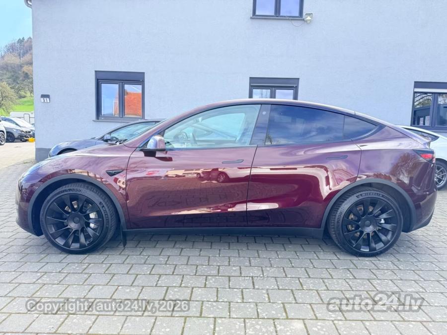 Red Tesla Model Y 2023 in Tartu, with an engine capacity of 0.00 L and mileage of 55 thousand km for 39999 €, photo 9 on AUTOMOTO.COM.LV
