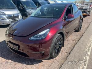 Red Tesla Model Y 2023 in Tartu, with an engine capacity of 0.00 L and mileage of 55 thousand km for 39999 €, photo 18 on AUTOMOTO.COM.LV