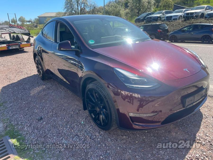 Red Tesla Model Y 2023 in Tartu, with an engine capacity of 0.00 L and mileage of 55 thousand km for 39999 €, photo 19 on AUTOMOTO.COM.LV