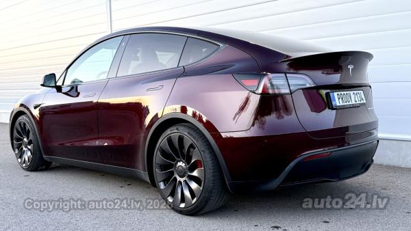 Red Tesla Model Y 2023 in Tallinn, with an engine capacity of 0.00 L and mileage of 56 thousand km for 38500 €, photo 6 on AUTOMOTO.COM.LV