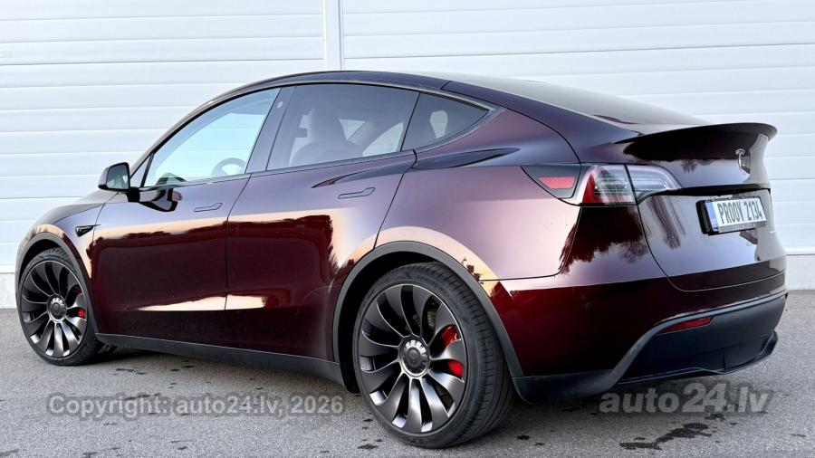 Red Tesla Model Y 2023 in Tallinn, with an engine capacity of 0.00 L and mileage of 56 thousand km for 38500 €, photo 3 on AUTOMOTO.COM.LV
