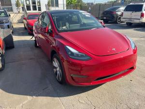 Sarkans Tesla Model Y 2023 Kauņa, ar dzinēja tilpumu 0.00 L un nobraukumu 26 tūkst. km par 22450 €, foto  vietnē AUTOMOTO.COM.LV