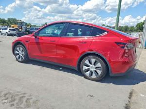 Red Tesla Model Y 2023 in Kaunas, with an engine capacity of 0.00 L and mileage of 26 thousand km for 22450 €, photo 5 on AUTOMOTO.COM.LV