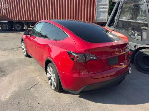 Red Tesla Model Y 2023 in Kaunas, with an engine capacity of 0.00 L and mileage of 26 thousand km for 22450 €, photo 7 on AUTOMOTO.COM.LV