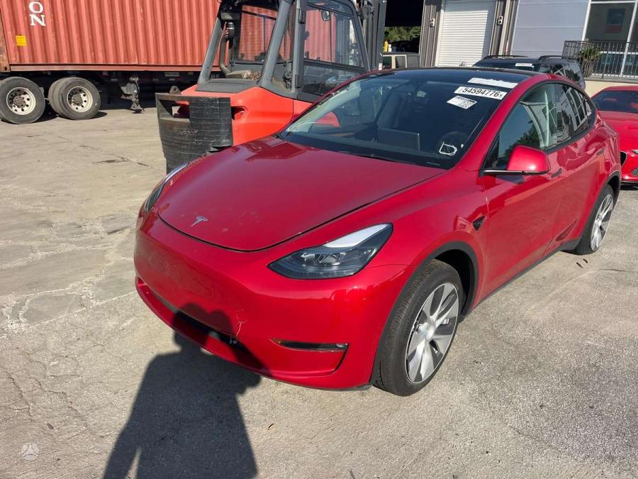 Red Tesla Model Y 2023 in Kaunas, with an engine capacity of 0.00 L and mileage of 26 thousand km for 22450 €, photo 11 on AUTOMOTO.COM.LV