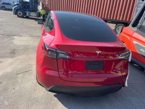 Red Tesla Model Y 2023 in Kaunas, with an engine capacity of 0.00 L and mileage of 26 thousand km for 22450 €, photo 14 on AUTOMOTO.COM.LV
