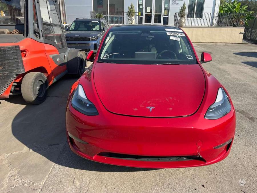 Red Tesla Model Y 2023 in Kaunas, with an engine capacity of 0.00 L and mileage of 26 thousand km for 22450 €, photo 15 on AUTOMOTO.COM.LV