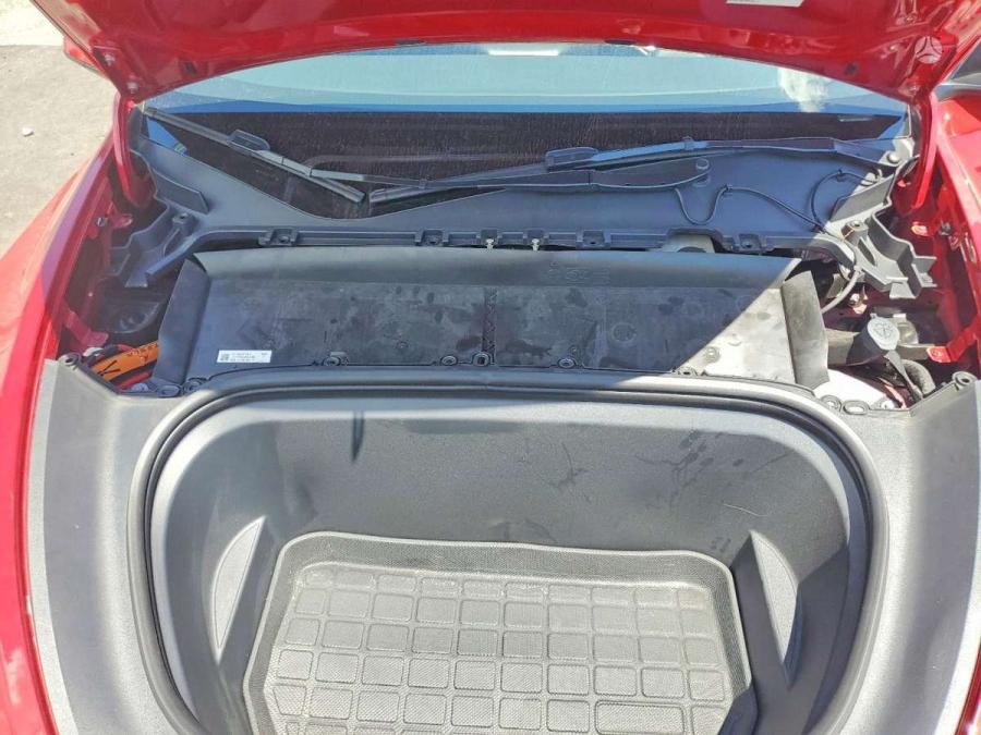 Red Tesla Model Y 2023 in Kaunas, with an engine capacity of 0.00 L and mileage of 26 thousand km for 22450 €, photo 16 on AUTOMOTO.COM.LV