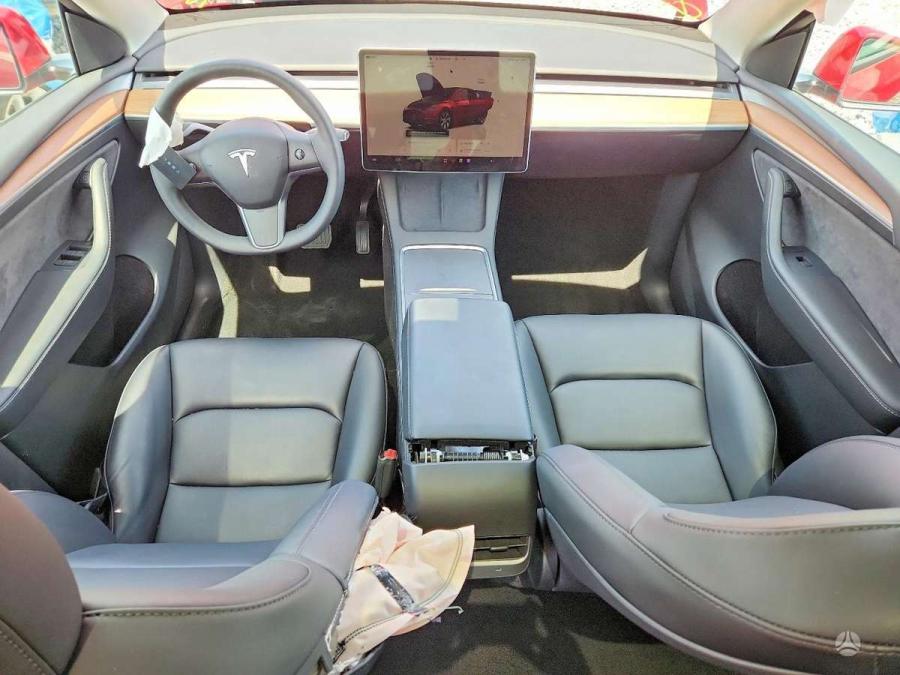 Red Tesla Model Y 2023 in Kaunas, with an engine capacity of 0.00 L and mileage of 26 thousand km for 22450 €, photo 17 on AUTOMOTO.COM.LV