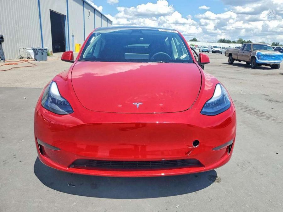 Red Tesla Model Y 2023 in Kaunas, with an engine capacity of 0.00 L and mileage of 26 thousand km for 22450 €, photo 18 on AUTOMOTO.COM.LV