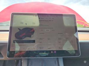 Red Tesla Model Y 2023 in Kaunas, with an engine capacity of 0.00 L and mileage of 26 thousand km for 22450 €, photo 20 on AUTOMOTO.COM.LV