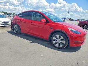 Red Tesla Model Y 2023 in Kaunas, with an engine capacity of 0.00 L and mileage of 26 thousand km for 22450 €, photo 23 on AUTOMOTO.COM.LV