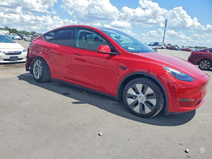 Red Tesla Model Y 2023 in Kaunas, with an engine capacity of 0.00 L and mileage of 26 thousand km for 22450 €, photo 23 on AUTOMOTO.COM.LV