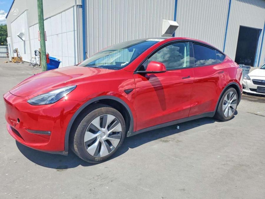 Red Tesla Model Y 2023 in Kaunas, with an engine capacity of 0.00 L and mileage of 26 thousand km for 22450 €, photo 24 on AUTOMOTO.COM.LV