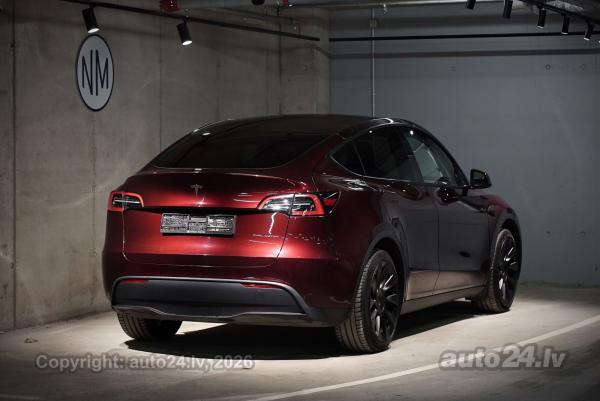 Red Tesla Model Y 2023 in Tallinn, with an engine capacity of 0.00 L and mileage of 40 thousand km for 42990 €, photo 5 on AUTOMOTO.COM.LV