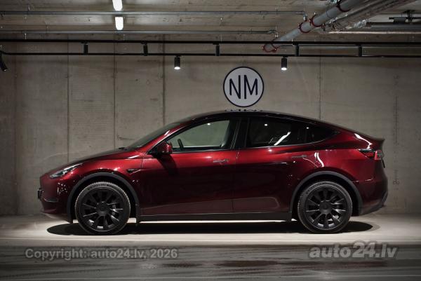 Red Tesla Model Y 2023 in Tallinn, with an engine capacity of 0.00 L and mileage of 40 thousand km for 42990 €, photo 7 on AUTOMOTO.COM.LV