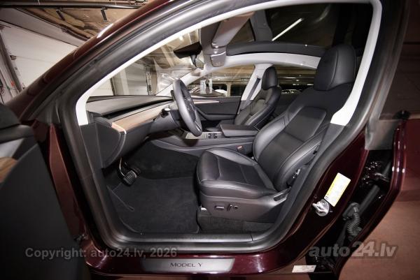 Red Tesla Model Y 2023 in Tallinn, with an engine capacity of 0.00 L and mileage of 40 thousand km for 42990 €, photo 11 on AUTOMOTO.COM.LV