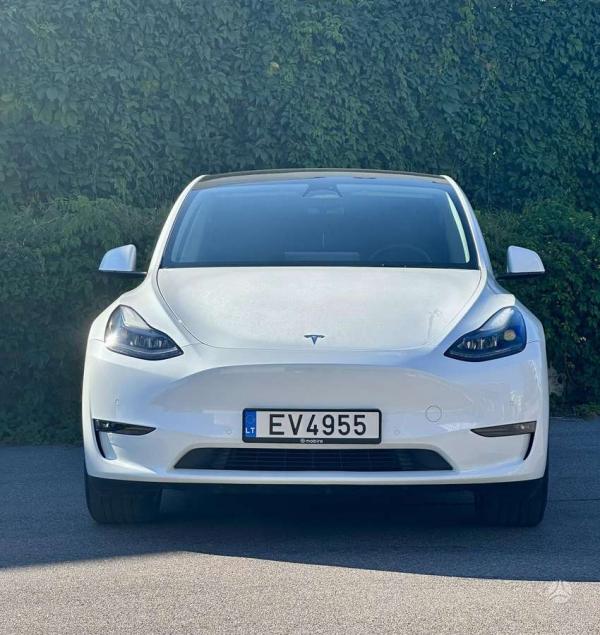 White Tesla Model Y 2022 in Vilnius, with an engine capacity of 0.00 L and mileage of 63 thousand km for 35400 €, photo 3 on AUTOMOTO.COM.LV