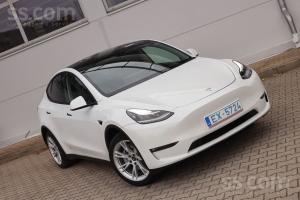 White Tesla Model Y 2020 in Riga, with an engine capacity of 0.00 L and mileage of 73 thousand km for 28995 €, photo 4 on AUTOMOTO.COM.LV
