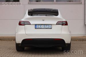 White Tesla Model Y 2020 in Riga, with an engine capacity of 0.00 L and mileage of 73 thousand km for 28995 €, photo 7 on AUTOMOTO.COM.LV