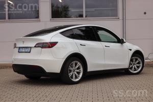 White Tesla Model Y 2020 in Riga, with an engine capacity of 0.00 L and mileage of 73 thousand km for 28995 €, photo 8 on AUTOMOTO.COM.LV