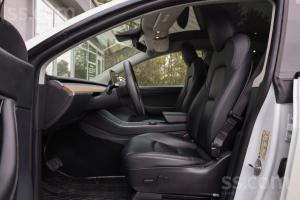 White Tesla Model Y 2020 in Riga, with an engine capacity of 0.00 L and mileage of 73 thousand km for 28995 €, photo 10 on AUTOMOTO.COM.LV