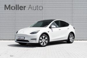 Balts Tesla Model Y 2021 Mārupe, ar dzinēja tilpumu 0.00 L un nobraukumu 71 tūkst. km par 32150 €, foto  vietnē AUTOMOTO.COM.LV