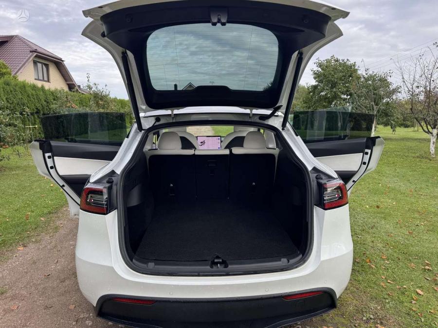 Balts Tesla Model Y 2021 Klaipėda, ar dzinēja tilpumu 0.00 L un nobraukumu 84 tūkst. km par 26900 €, foto 83 vietnē AUTOMOTO.COM.LV