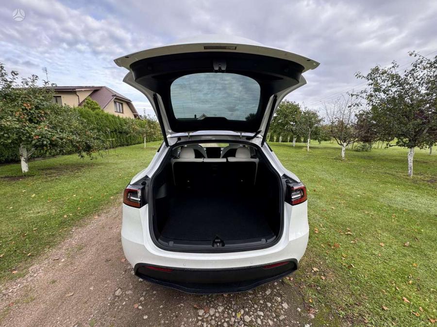 Balts Tesla Model Y 2021 Klaipėda, ar dzinēja tilpumu 0.00 L un nobraukumu 84 tūkst. km par 26900 €, foto 85 vietnē AUTOMOTO.COM.LV