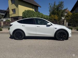 Balts Tesla Model Y 2021 Alīta, ar dzinēja tilpumu 0.00 L un nobraukumu 98 tūkst. km par 28200 €, foto 5 vietnē AUTOMOTO.COM.LV