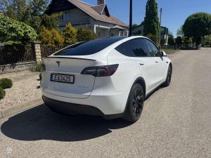 Balts Tesla Model Y 2021 Alīta, ar dzinēja tilpumu 0.00 L un nobraukumu 98 tūkst. km par 28200 €, foto 6 vietnē AUTOMOTO.COM.LV
