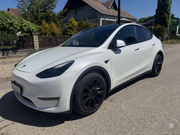 Balts Tesla Model Y 2021 Alīta, ar dzinēja tilpumu 0.00 L un nobraukumu 98 tūkst. km par 28200 €, foto 8 vietnē AUTOMOTO.COM.LV
