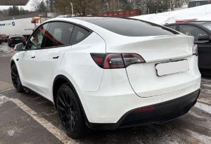 White Tesla Model Y 2022 in Vilnius, with an engine capacity of 0.00 L and mileage of 71 thousand km for 24684 €, photo 3 on AUTOMOTO.COM.LV