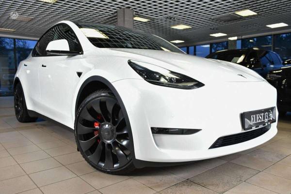 White Tesla Model Y 2022 in Tallinn, with an engine capacity of 0.00 L and mileage of 70 thousand km for 39890 €, photo 1 on AUTOMOTO.COM.LV