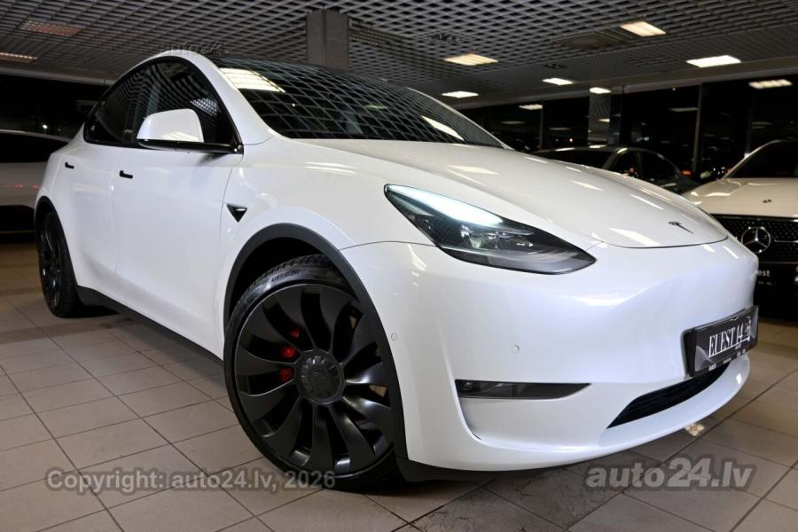 White Tesla Model Y 2022 in Tallinn, with an engine capacity of 0.00 L and mileage of 81 thousand km for 38990 €, photo 3 on AUTOMOTO.COM.LV