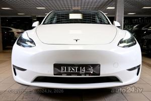 White Tesla Model Y 2022 in Tallinn, with an engine capacity of 0.00 L and mileage of 81 thousand km for 38990 €, photo 6 on AUTOMOTO.COM.LV