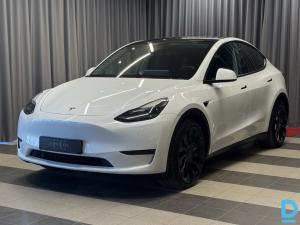 Balts Tesla Model Y 2022 Mārupe, ar dzinēja tilpumu 0.00 L un nobraukumu 101 tūkst. km par 31990 €, foto  vietnē AUTOMOTO.COM.LV